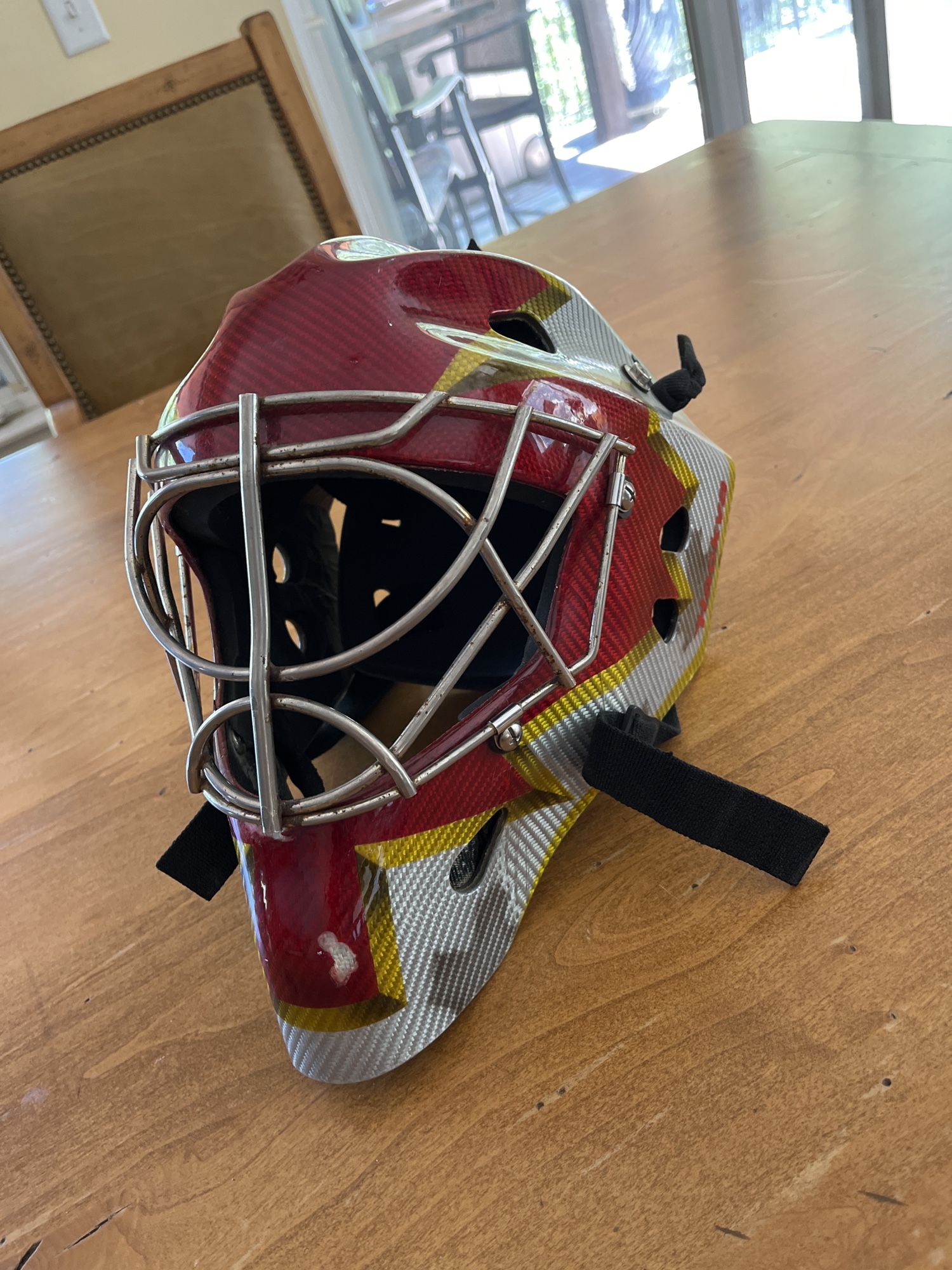 Used Hackva Pro Stock Goalie Mask - Red, Yellow, Silver | SidelineSwap