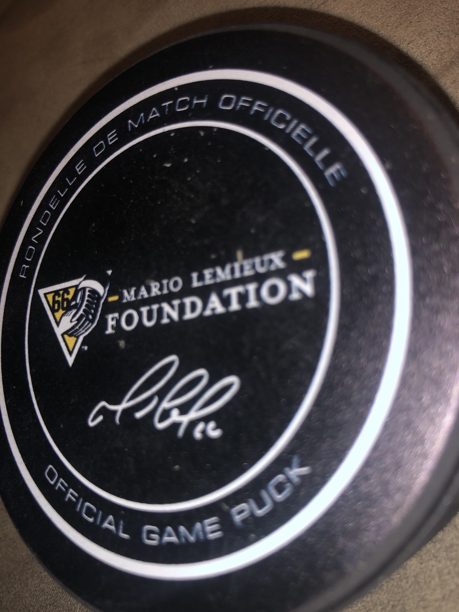 NEW Mario Lemieux foundation official puck | SidelineSwap