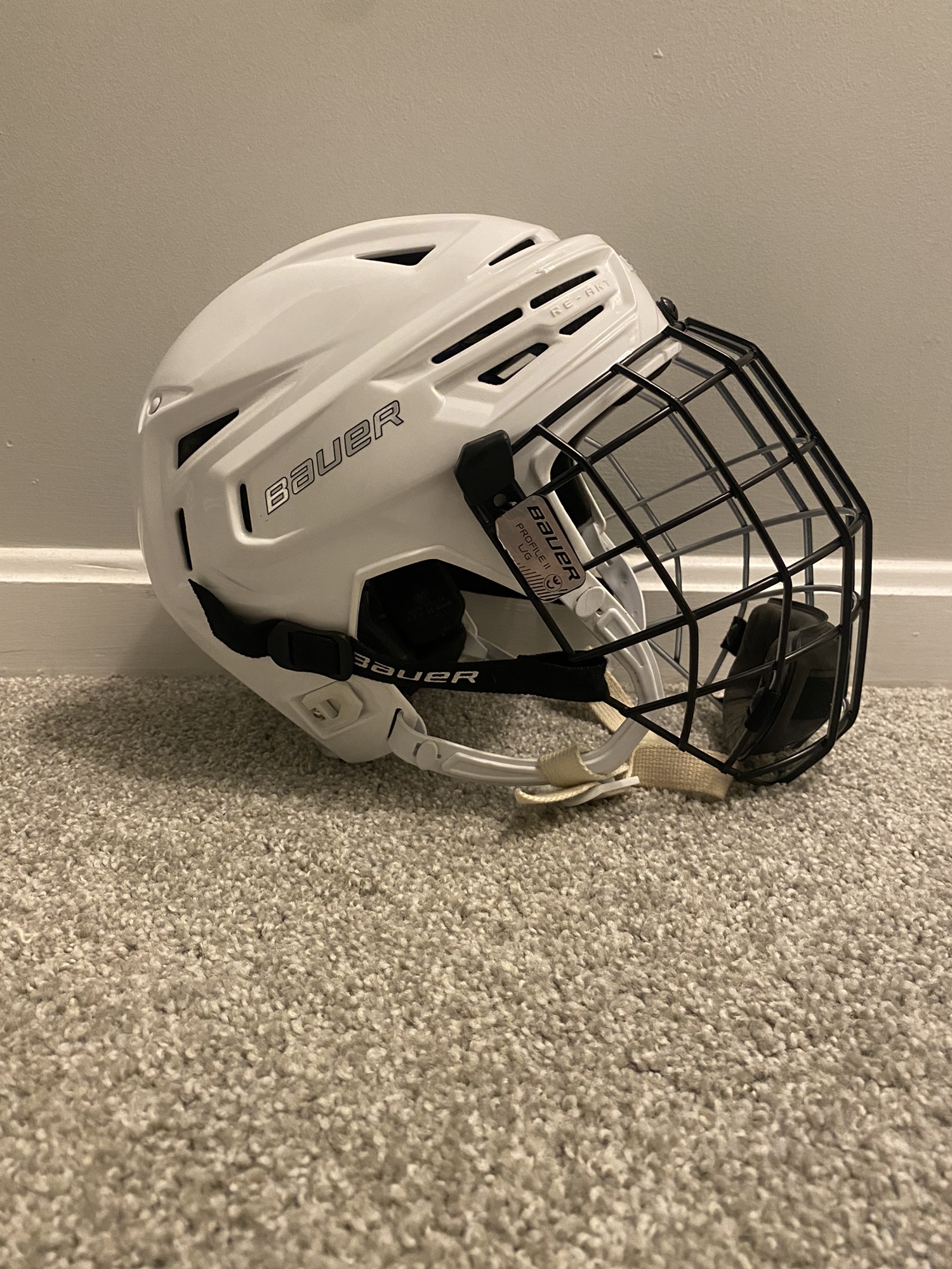 Used Medium Bauer Re-Akt 150 Helmet With Large Oreo Cage | SidelineSwap