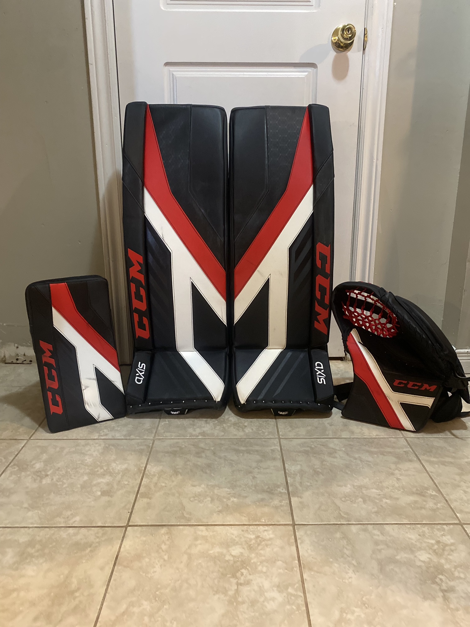 CCM AXIS Pro 34+1.5 Goalie leg pads and gloves 580 Break | SidelineSwap