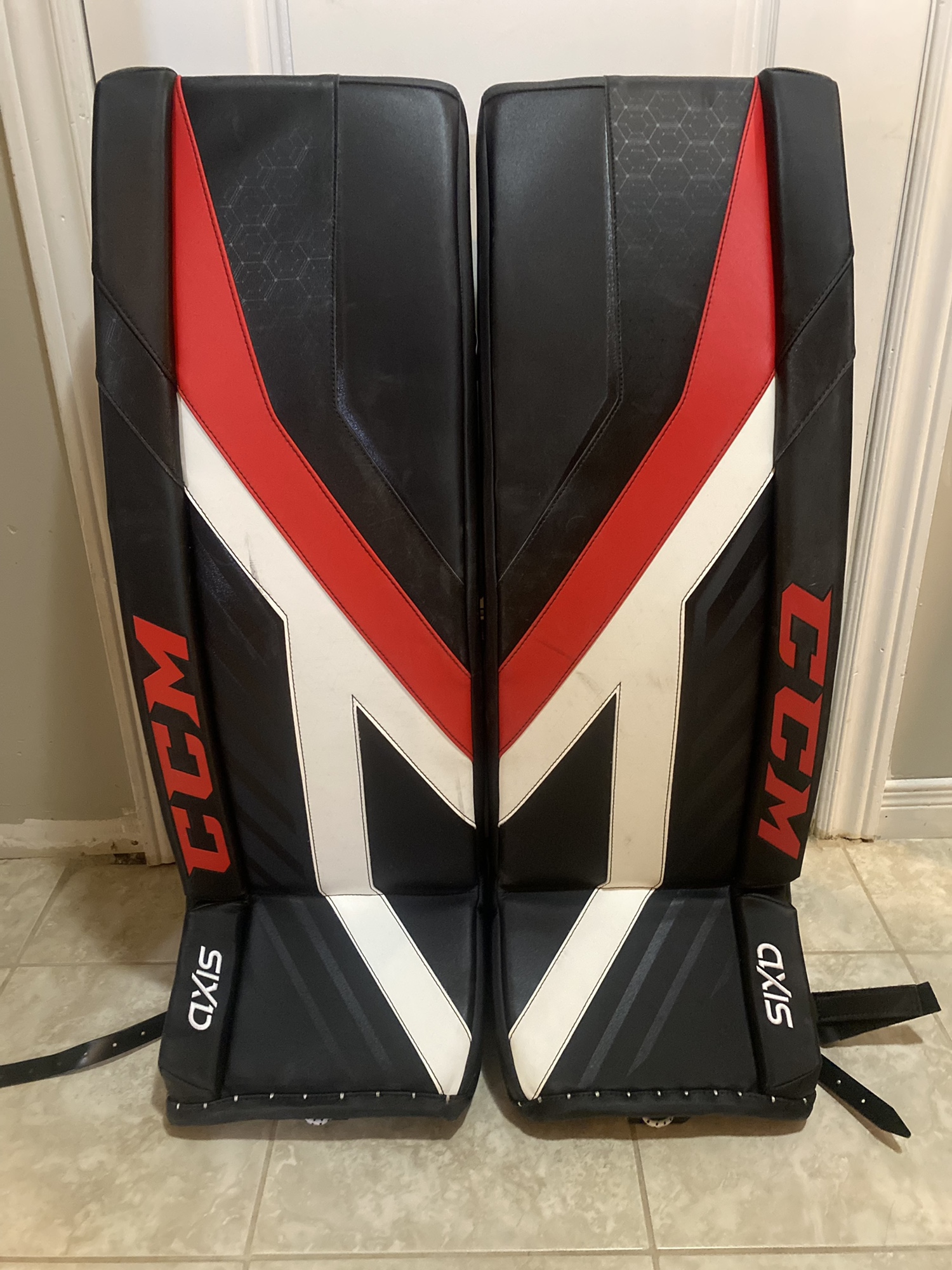 CCM AXIS Pro 34+1.5 Goalie leg pads and gloves 580 Break | SidelineSwap
