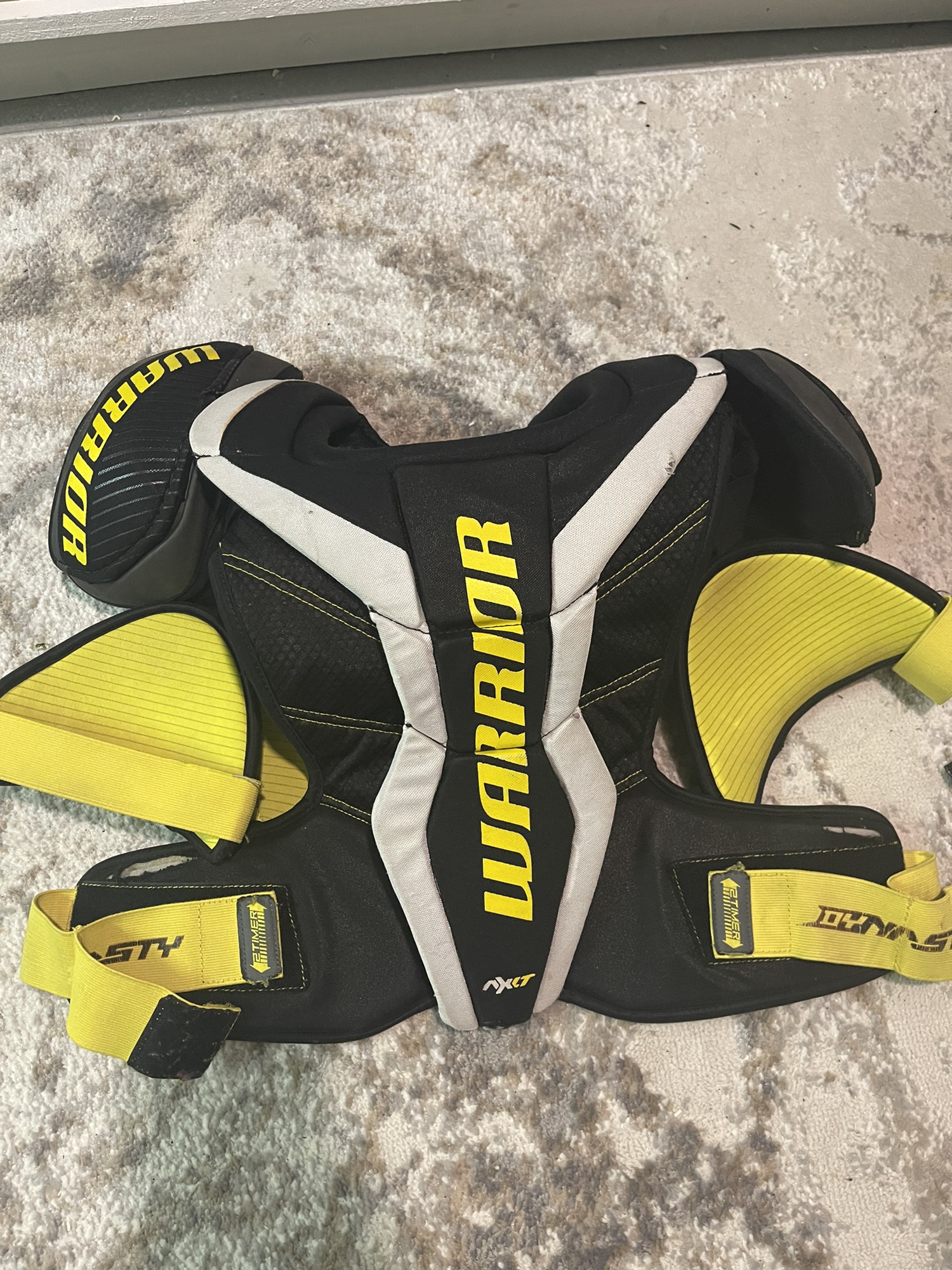 Used Medium Warrior Dynasty AXLT Shoulder Pads | SidelineSwap