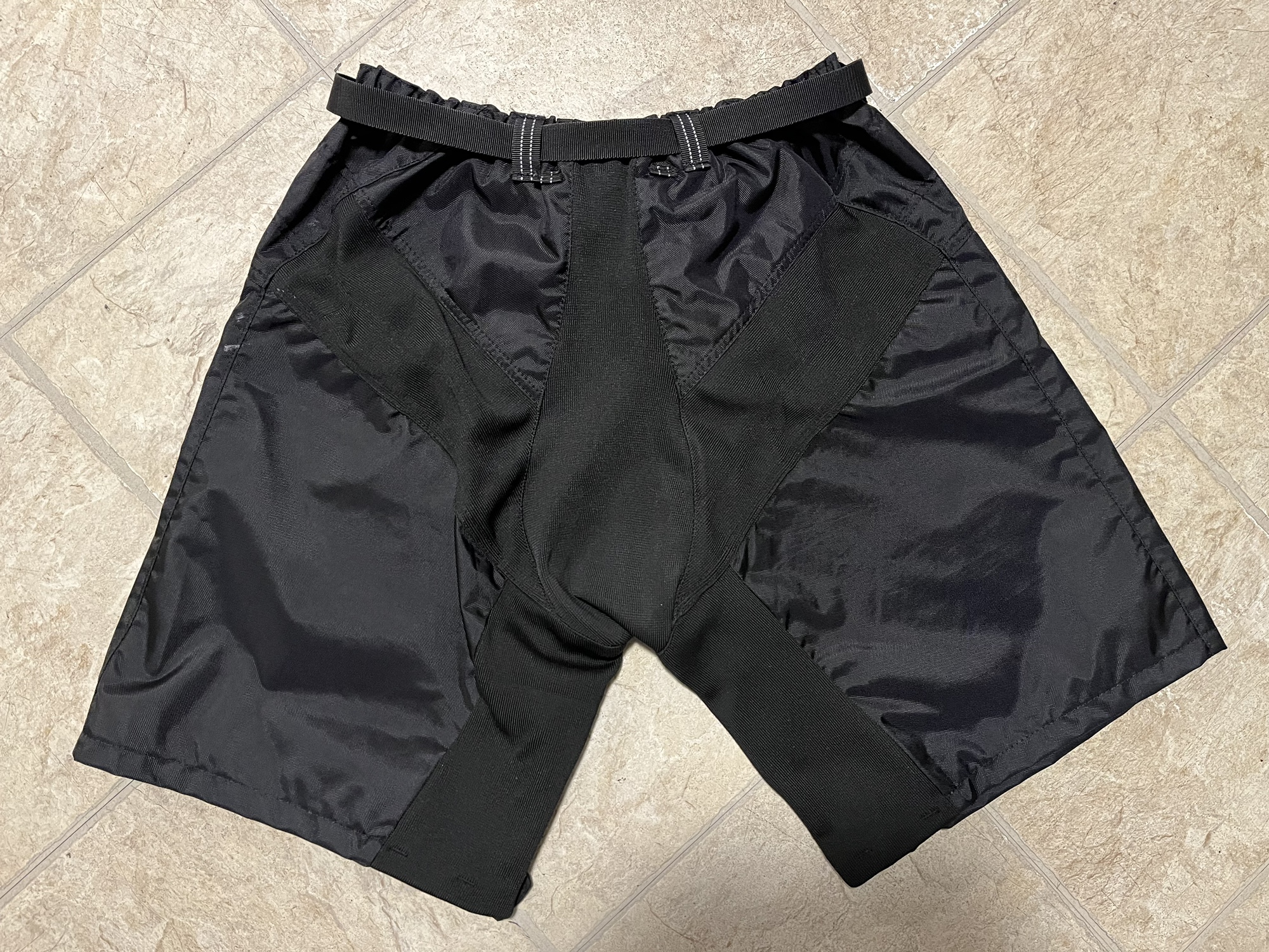 Nike branded Bauer hockey pant shell (Team Canada) Medium | SidelineSwap