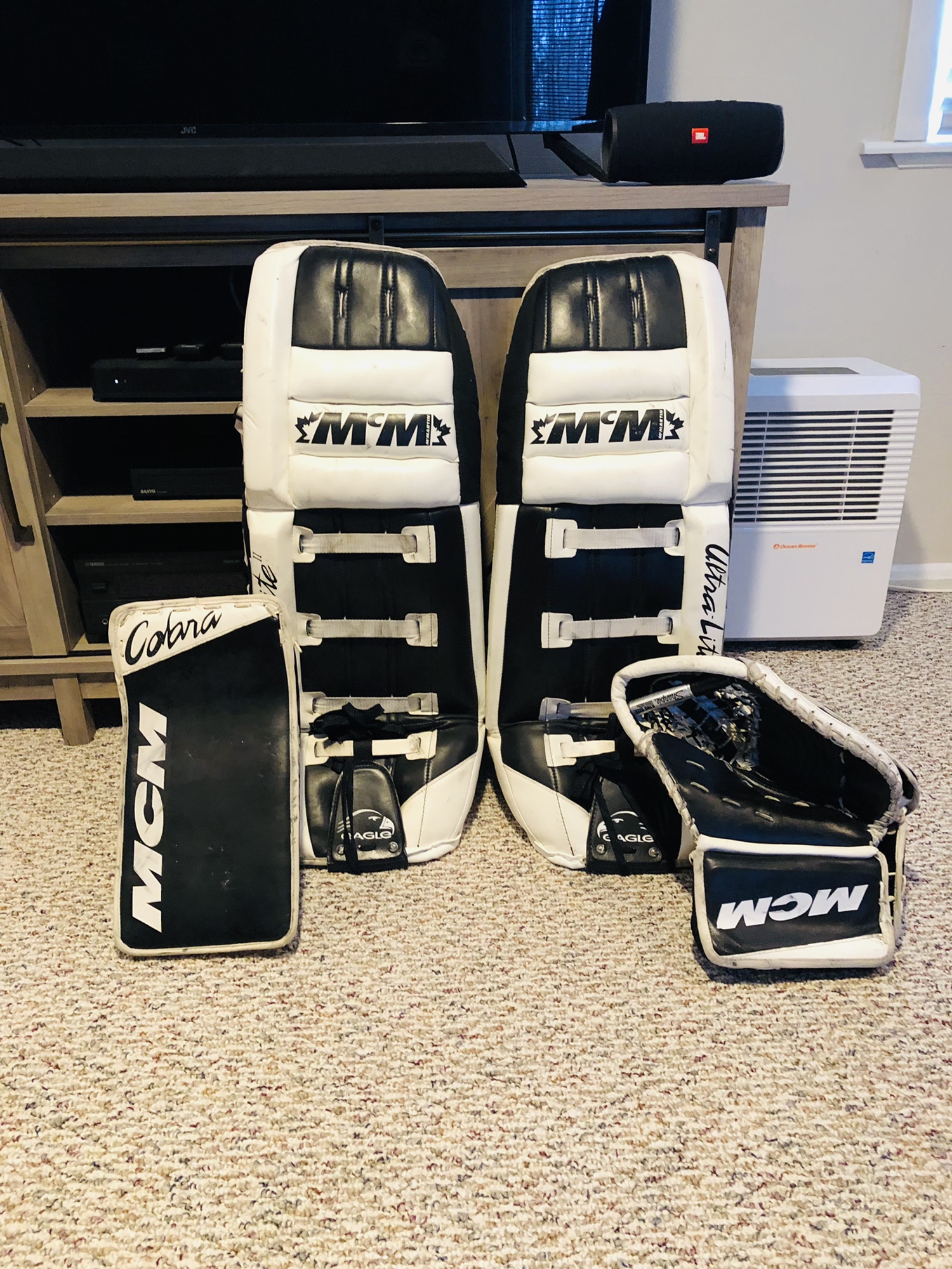 McM Ultralite pads 34in. and senior Cobra mitts | SidelineSwap