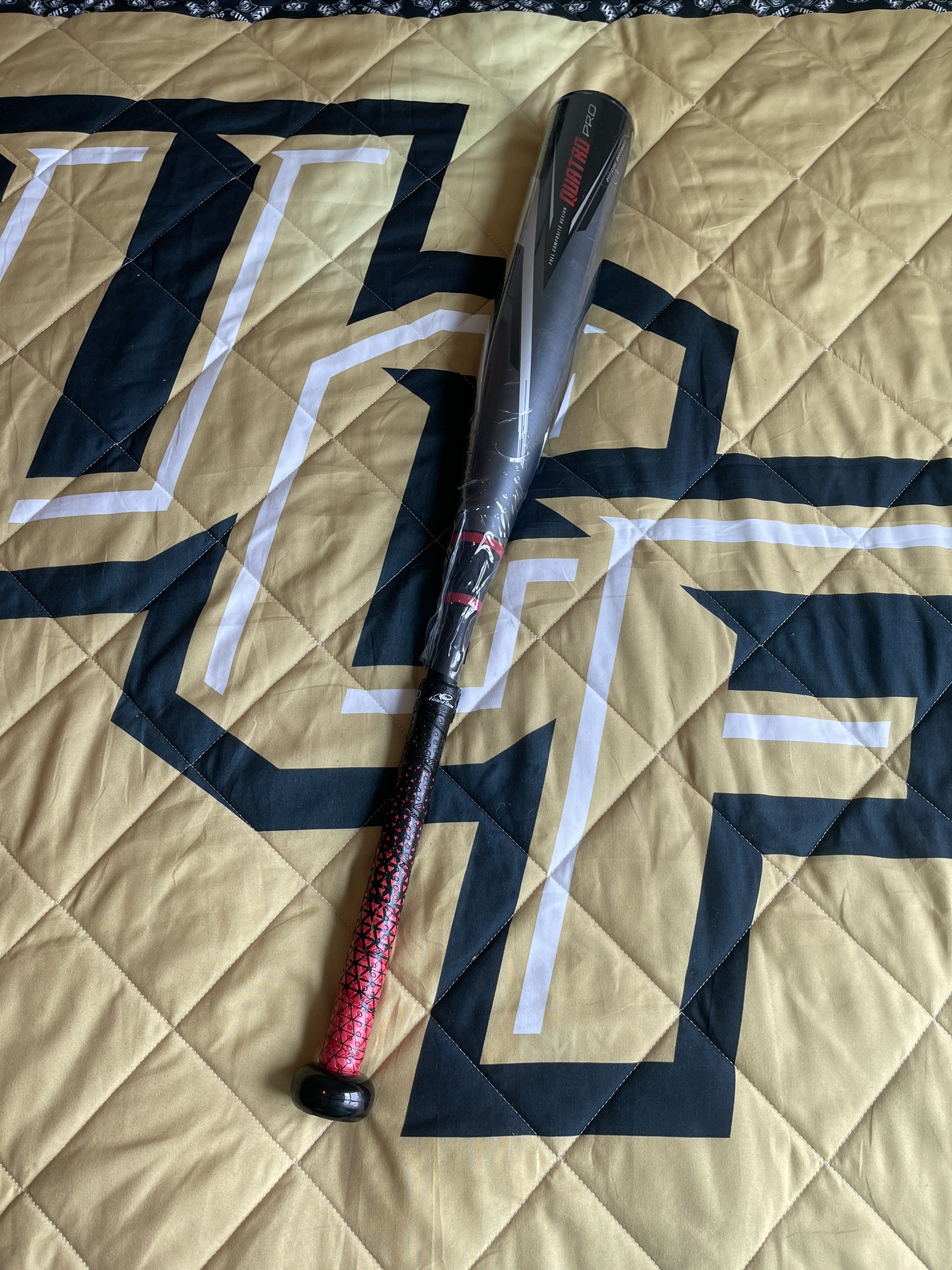 New In Wrapper Rawlings Quatro Pro 28/18 | SidelineSwap