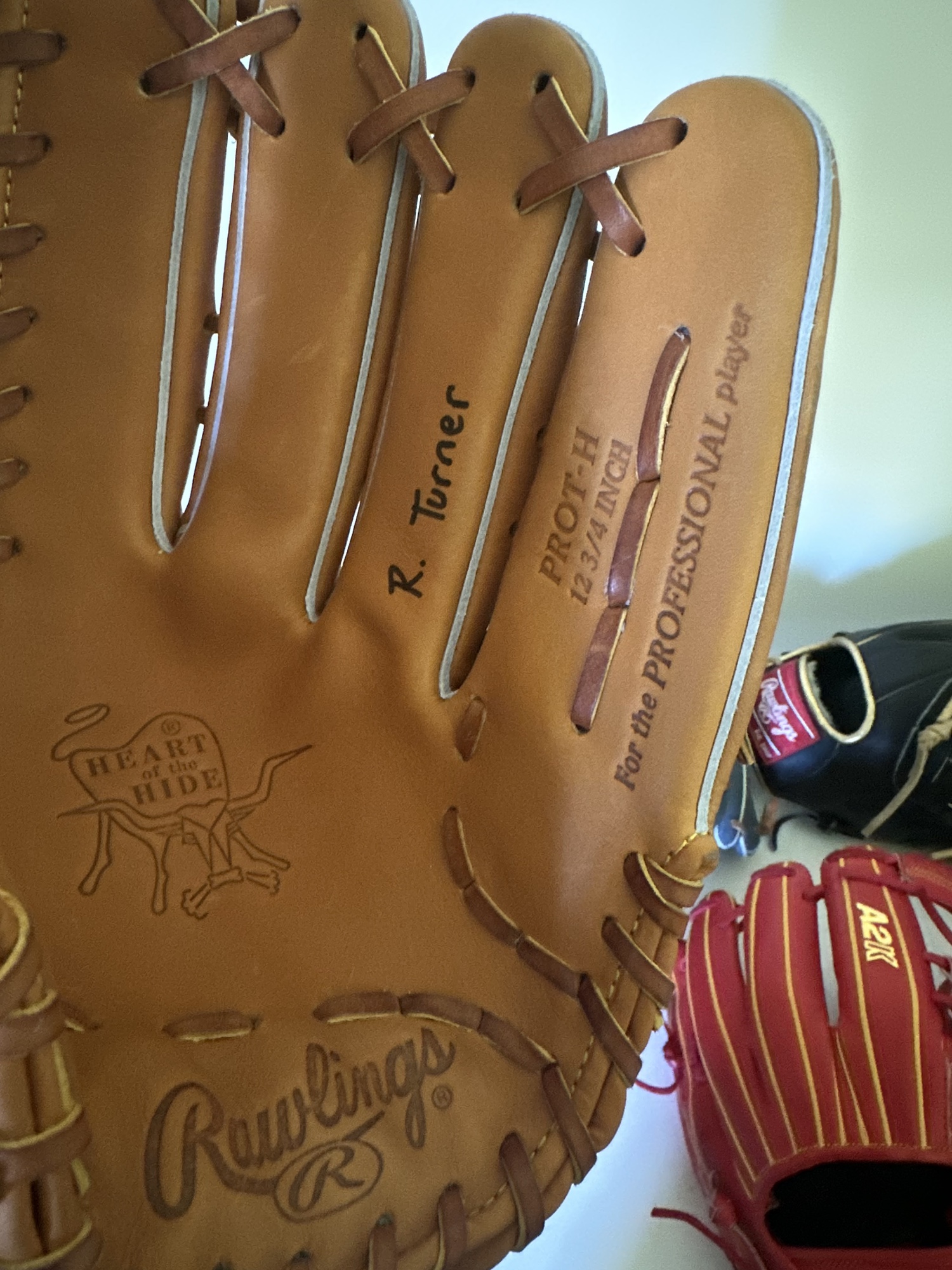 12.75 Horween Rawlings *HAS NAME SHARPIE ON FINGER* | SidelineSwap