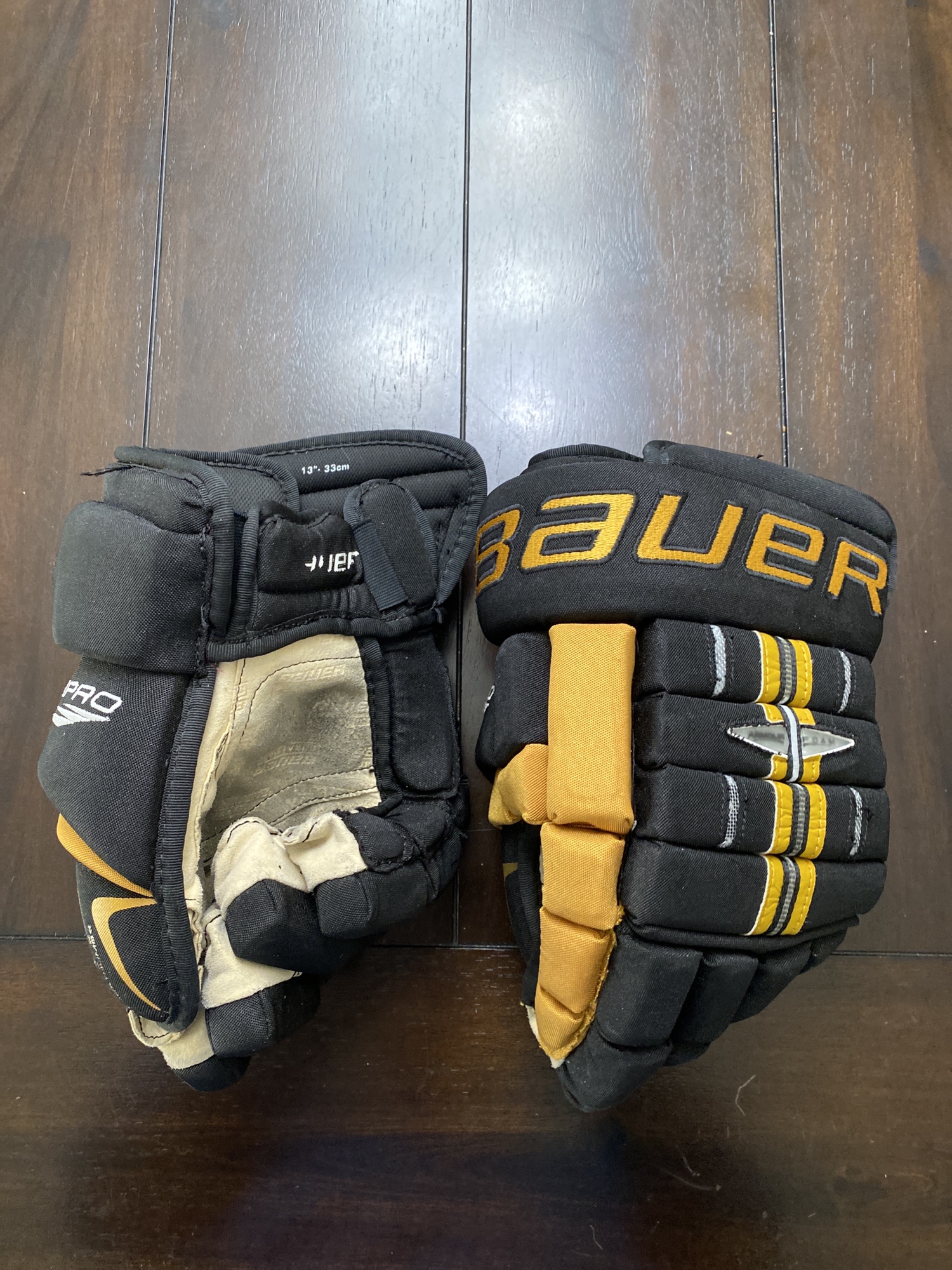 Bauer 4roll pro black/gold trim 13 gloves | SidelineSwap
