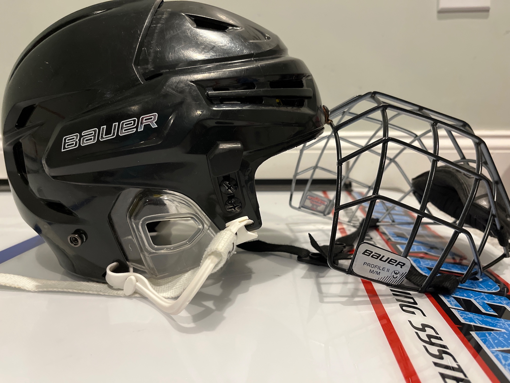 New Medium Bauer Re-Akt 100 Helmet With Bauer Oreo Cage | SidelineSwap