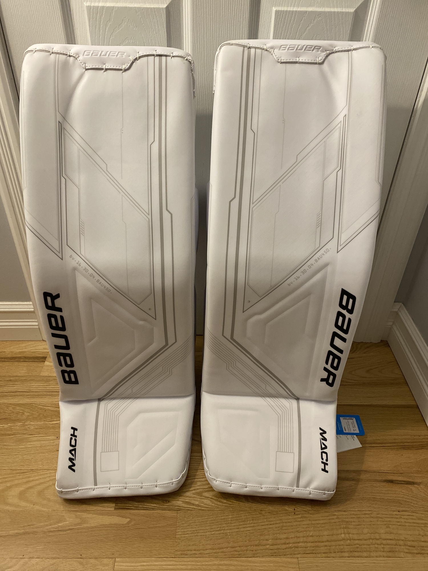 New white Bauer Mach pads 34+1 sr medium | SidelineSwap