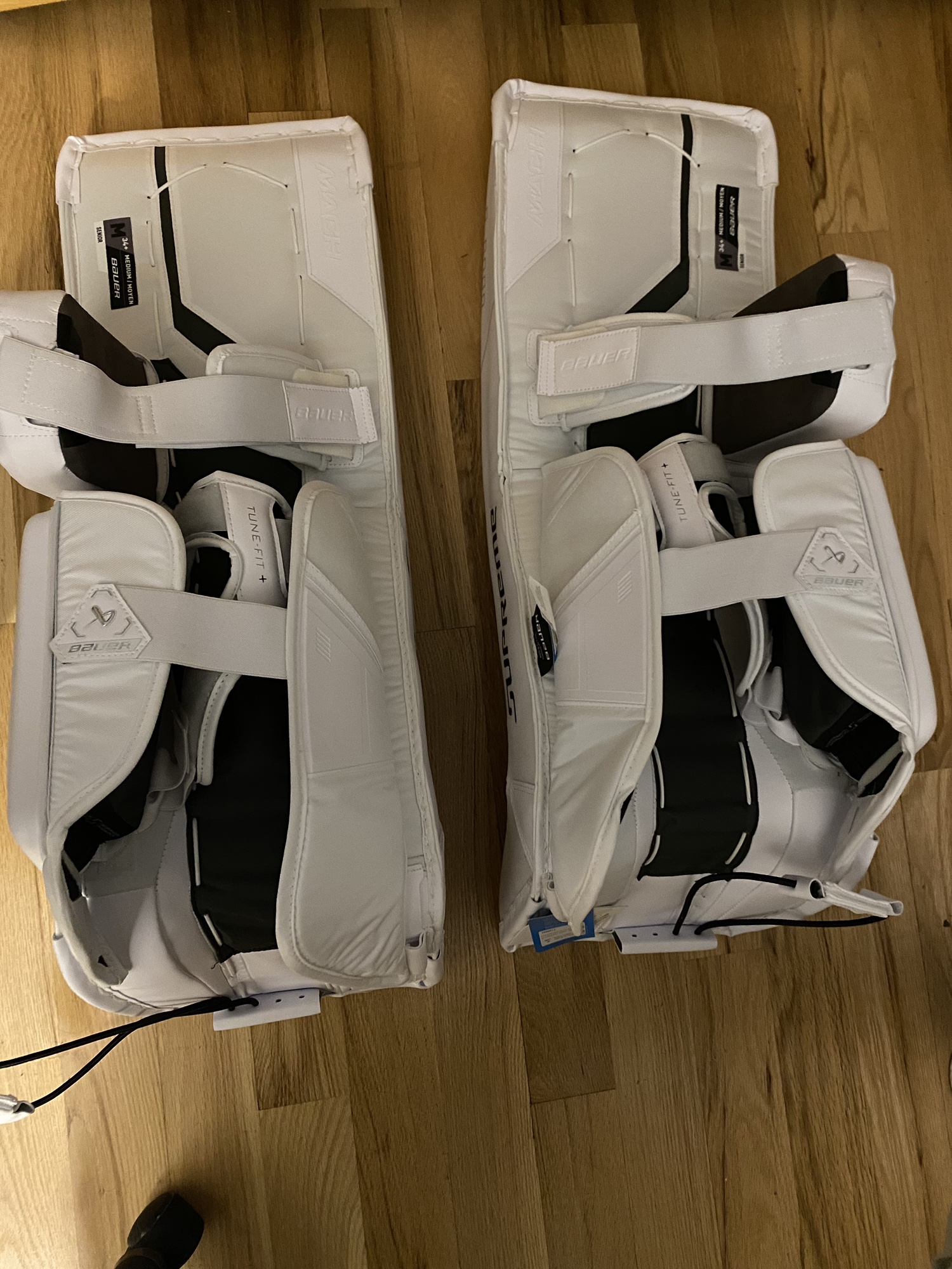 New white Bauer Mach pads 34+1 sr medium | SidelineSwap