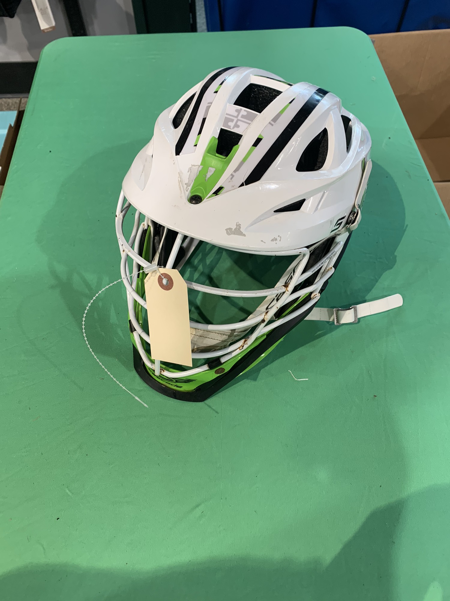 Used White Cascade S Helmet W/ Lime Green Chin Piece | SidelineSwap