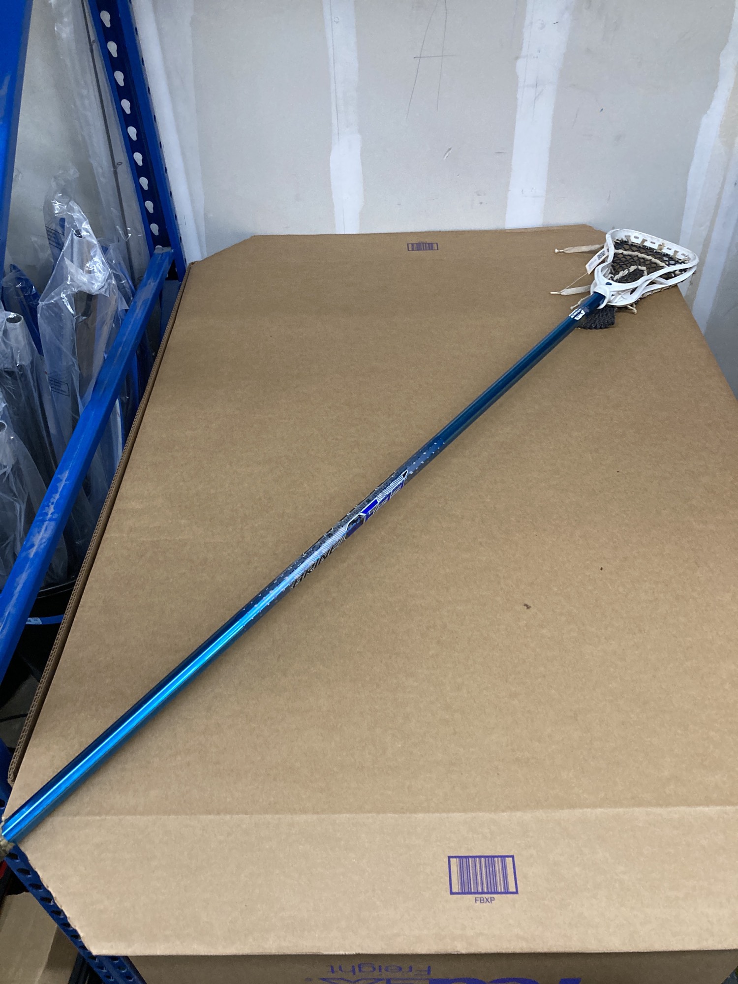 Used Brine f22 defense stick with Gait Stick | SidelineSwap