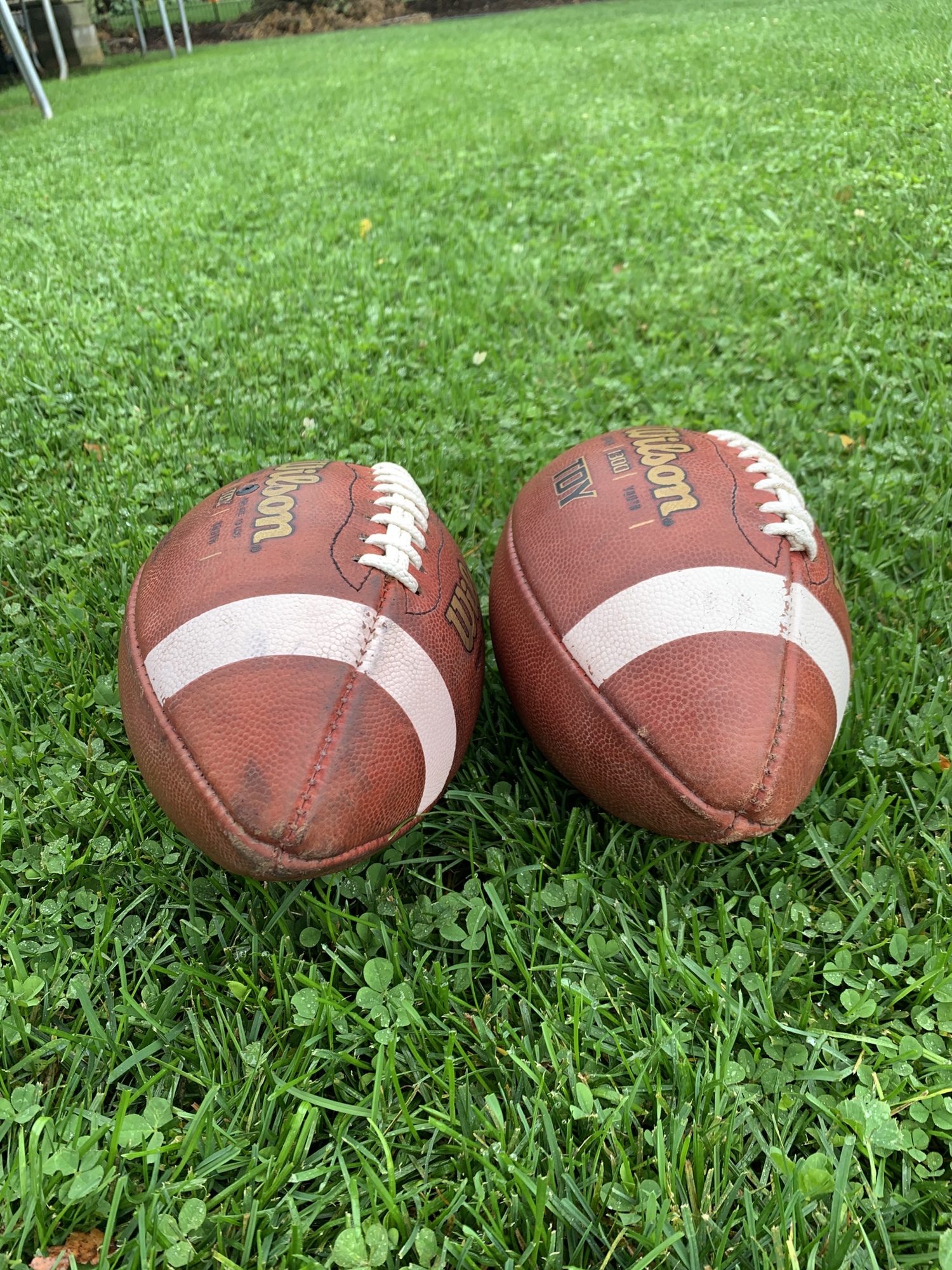 Two Youth Wilson Footballs | SidelineSwap