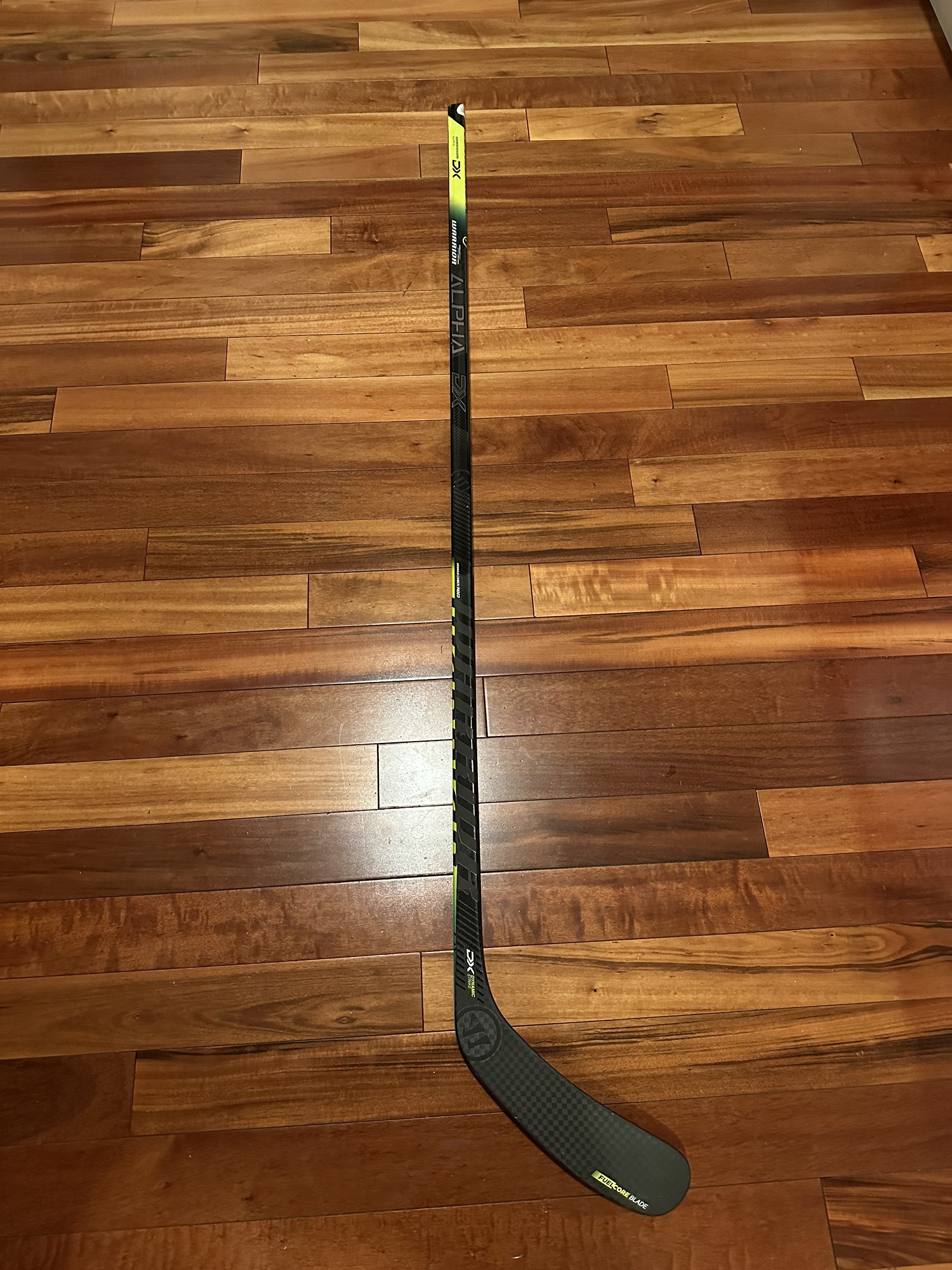 Warrior Alpha DX Senior Stick Right Hand W03 75 flex grip | SidelineSwap