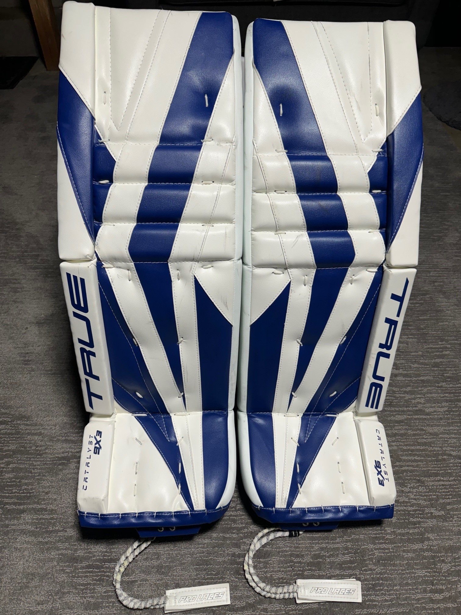 Like new 35" True 9X3 Goalie Leg Pads—White and Royal Blue | SidelineSwap