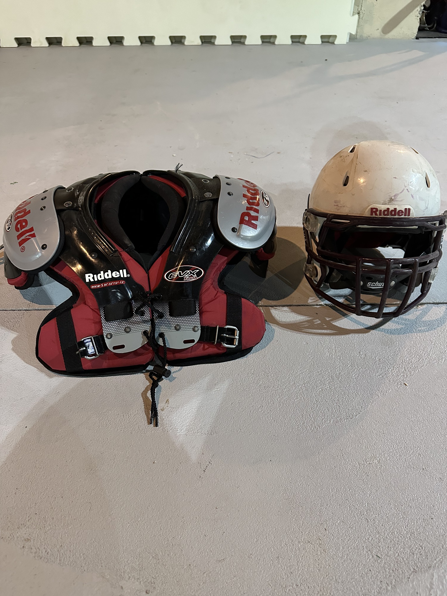 Used Riddell Youth Shoulder Pads And Helmet | SidelineSwap