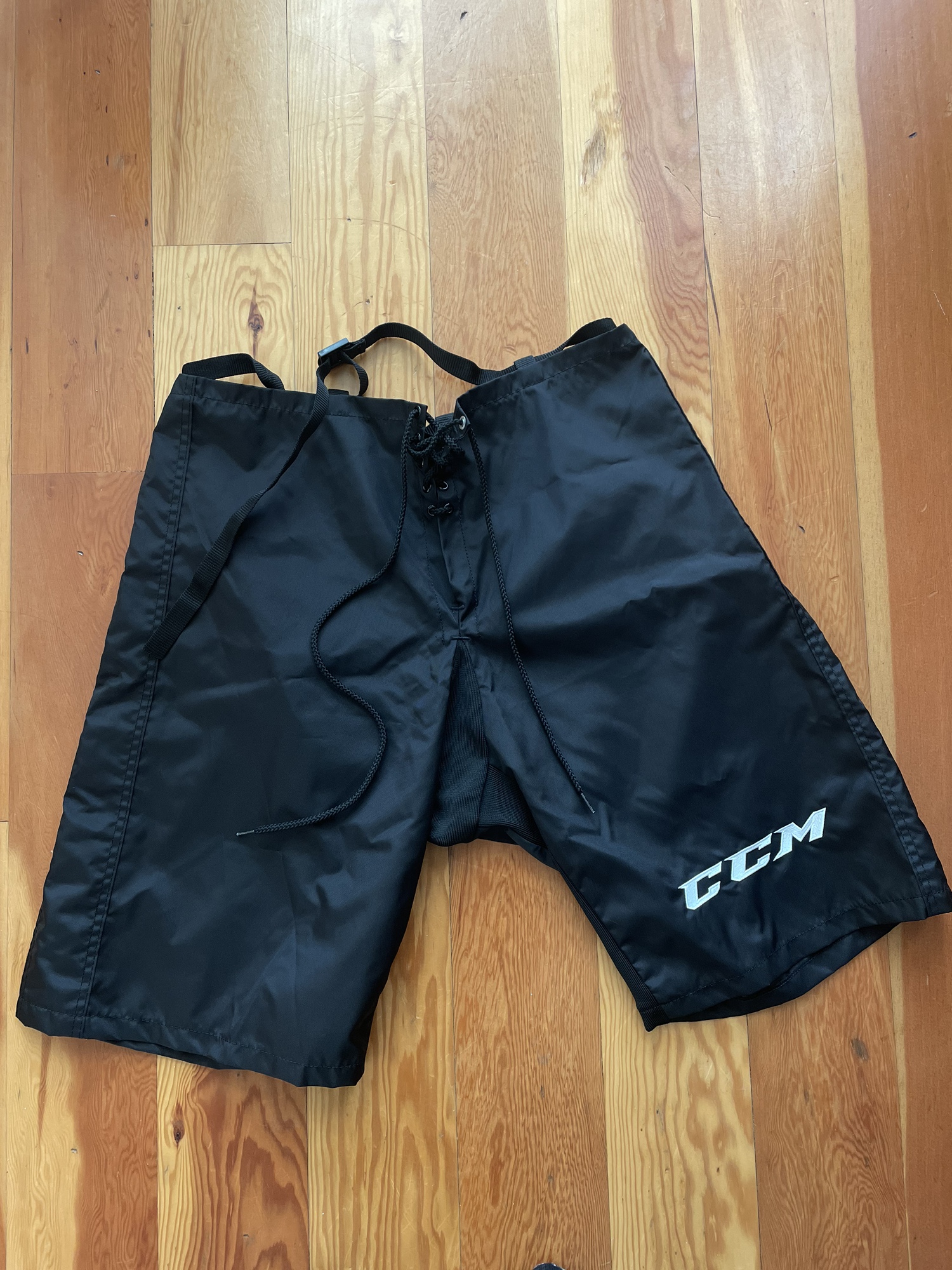 Black New Medium CCM Pro Stock PP10 Pant Shell | SidelineSwap