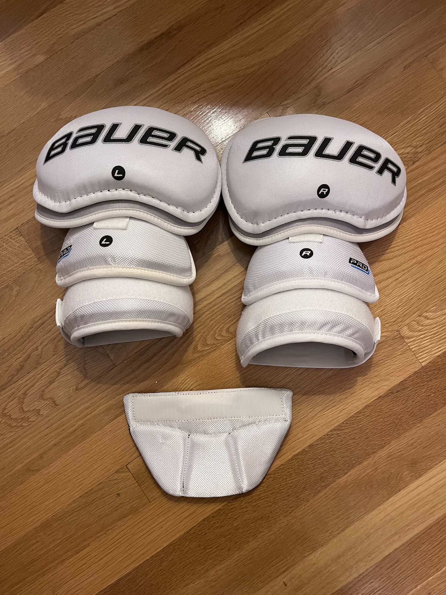 New Large Bauer Pro Stock Shoulder Caps | SidelineSwap