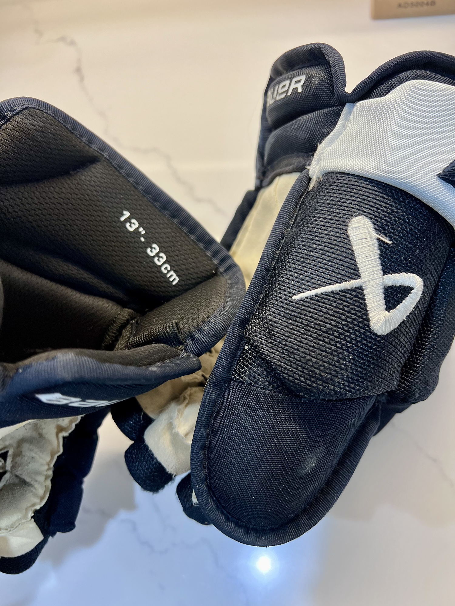 Pro Stock 13” Bauer Vapor Hyperlite Gloves (Navy and White) | SidelineSwap