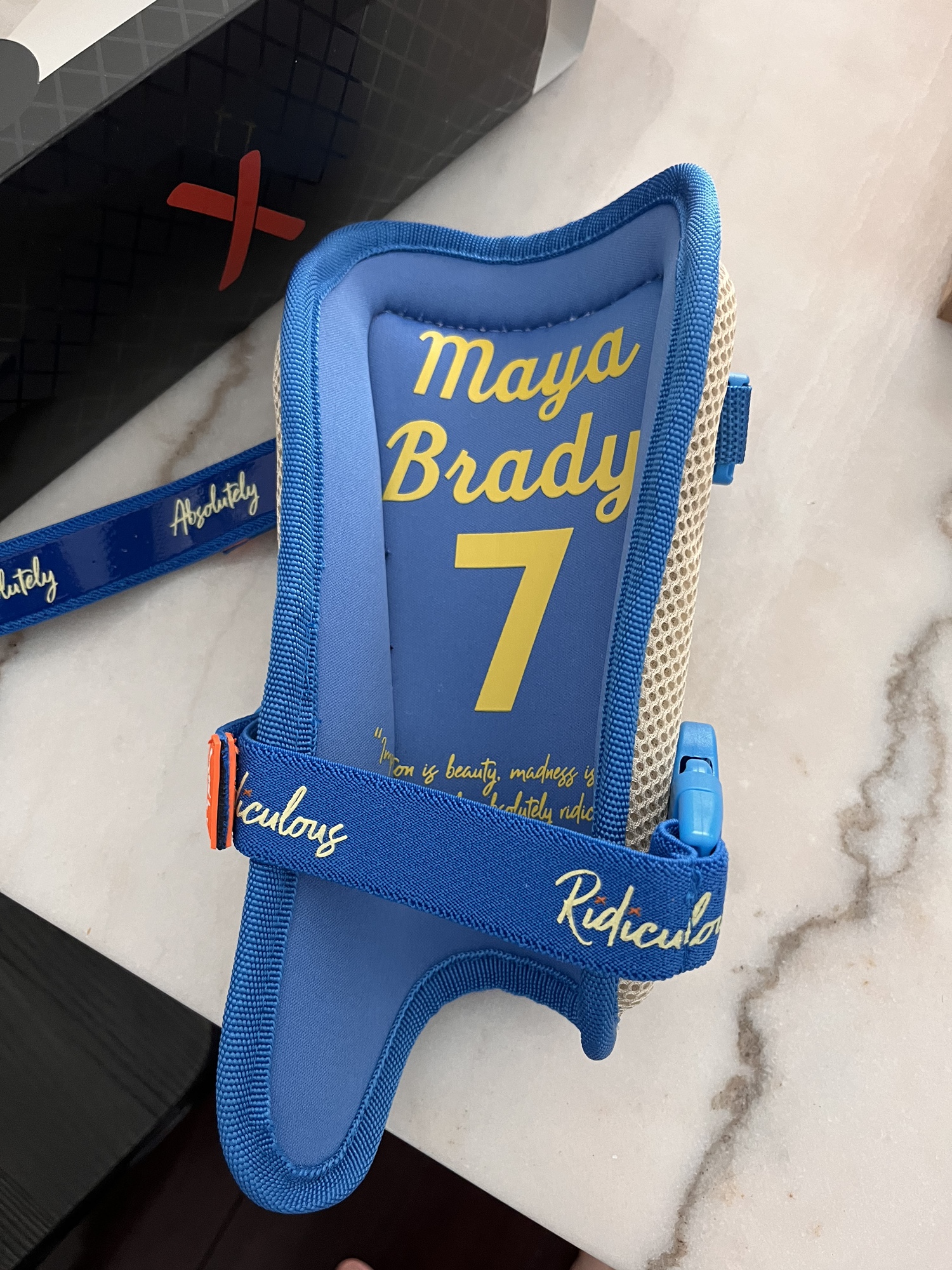 Maya Brady custom leg guard from absolutely ridiculous | SidelineSwap