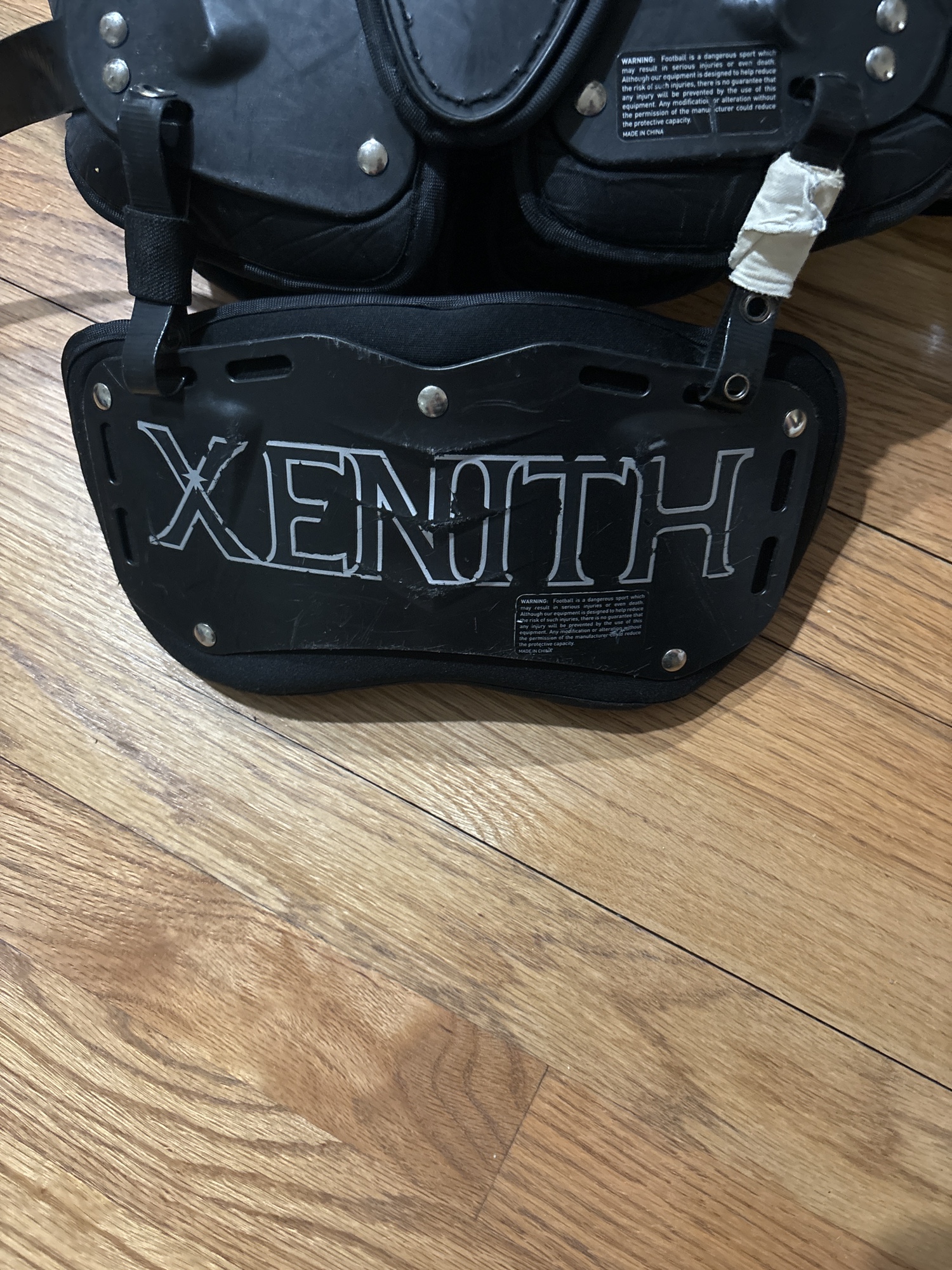Small Xenith shoulder pads/back Plate | SidelineSwap
